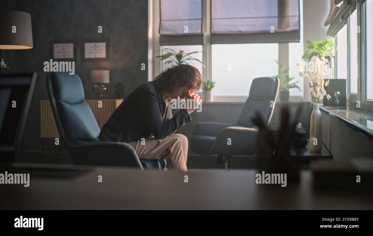 Tired female psychologist sits in hi-res stock photography and images ...