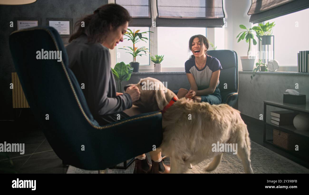 African American teenage girl sits in chair, discusses problems with ...