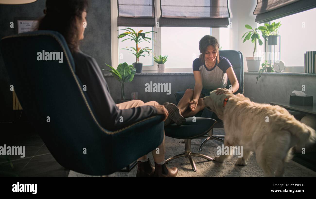 African American teenage girl sits in chair, discusses problems with ...