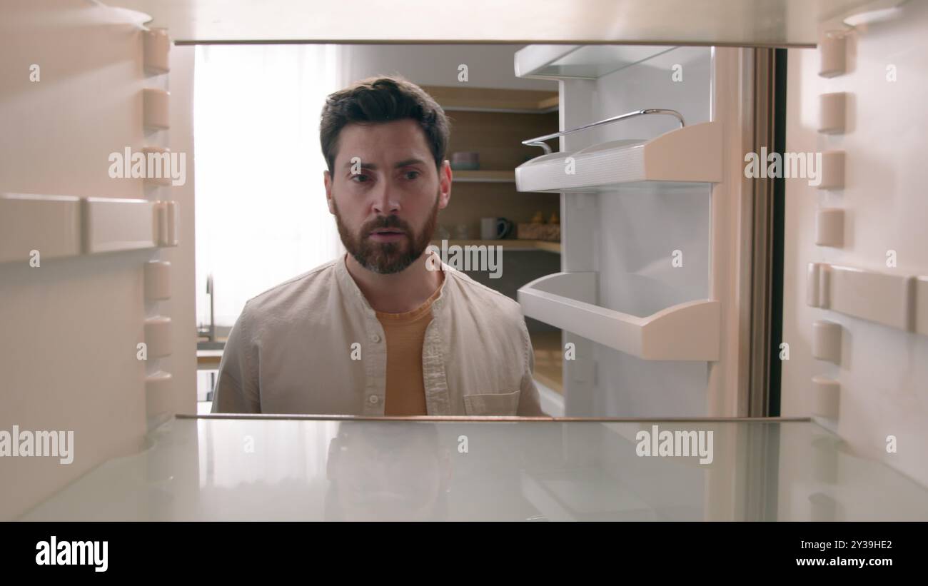 Disappointed empty fridge no hi-res stock photography and images - Alamy
