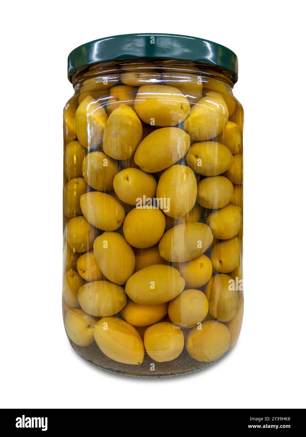 Large whole green olives in brine in large glass jar isolated on white ...