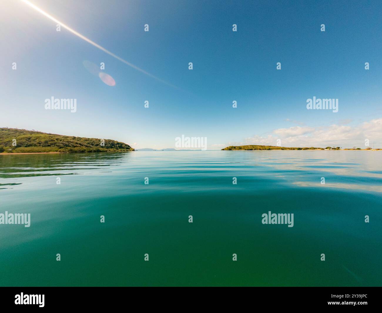 Lagoon in calm weather under the sun Noumea New Caledonia Stock Photo ...