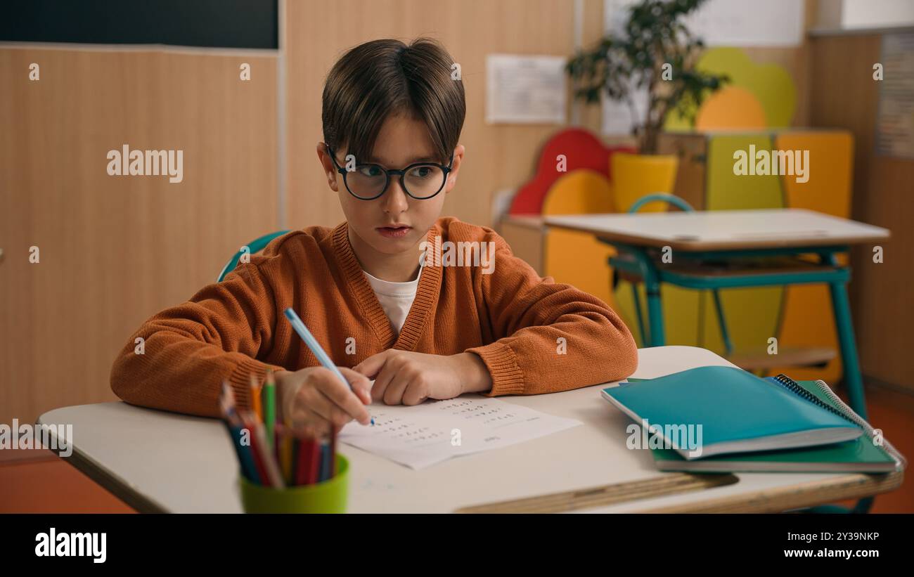 Private school course concentrated talking boy primary elementary learn ...