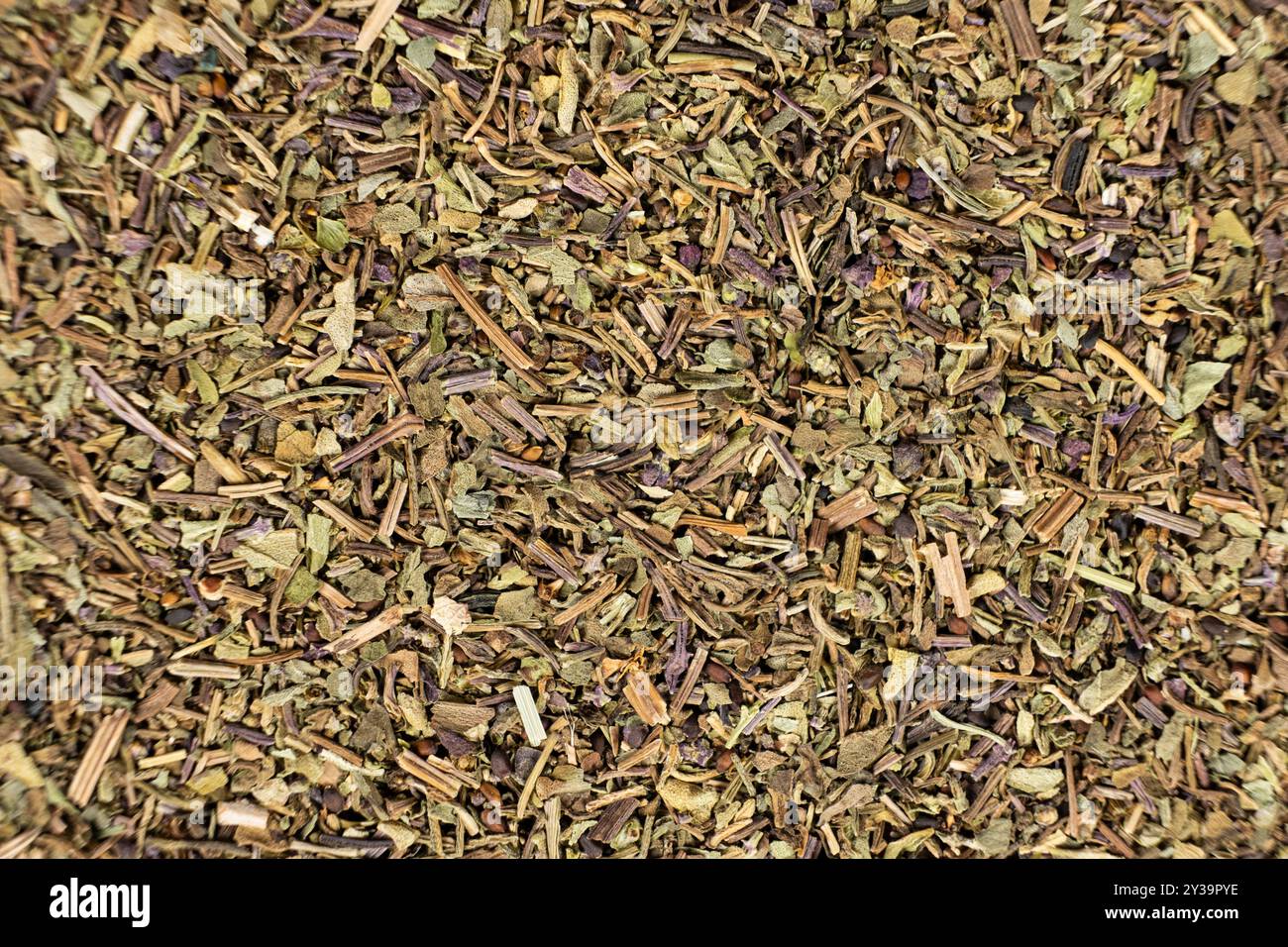 Dry basil spice seasoning macro texture top view Stock Photo - Alamy