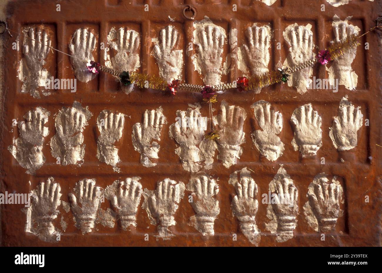 Women Queens Handprints of Sati and grid of Sculpted hands at the ...