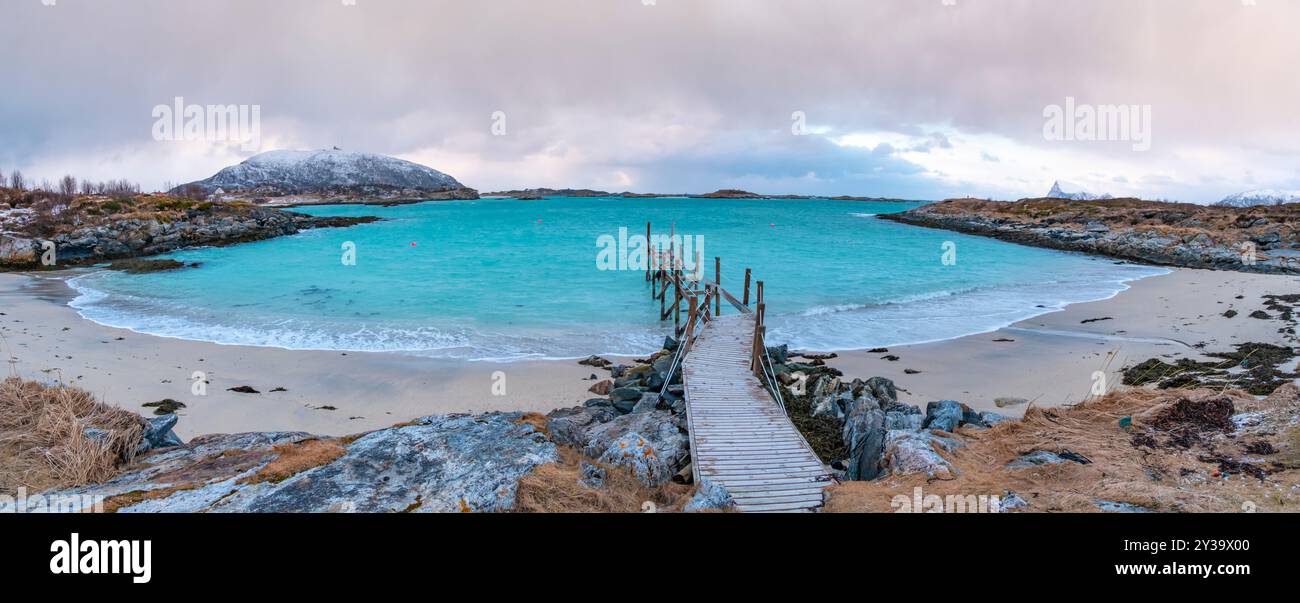 Sommaroy islands and arctic sea near Tromso Norway. Sunset over snowy ...