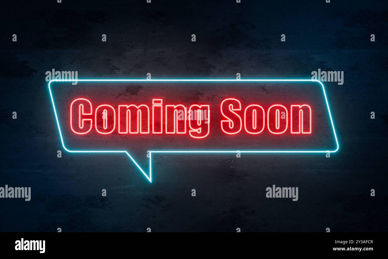 Coming soon. Coming soon. Illuminated neon sign in blue and red on a ...
