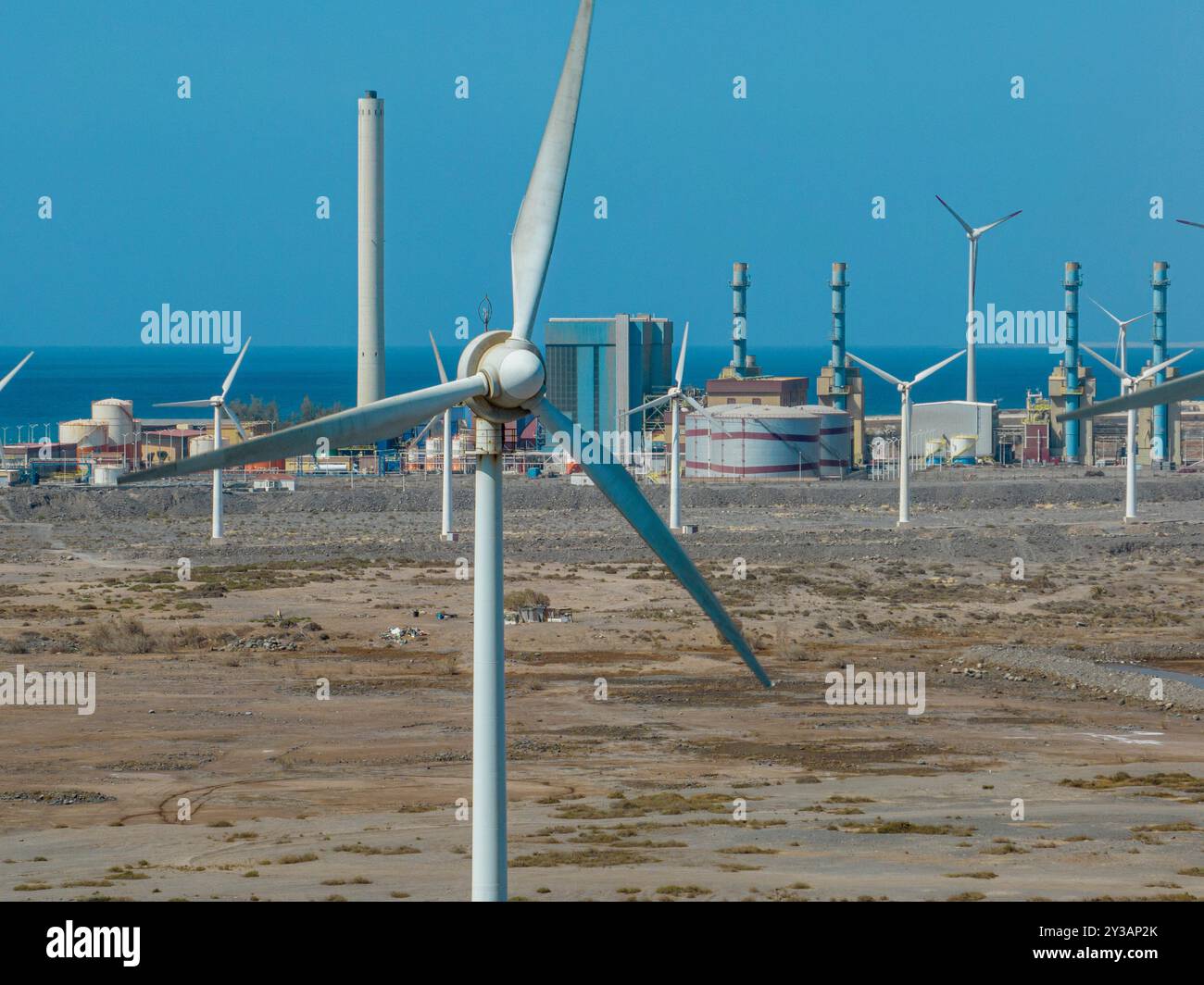 Renewable energy, wind energy, wind turbines moving, near the ocean ...
