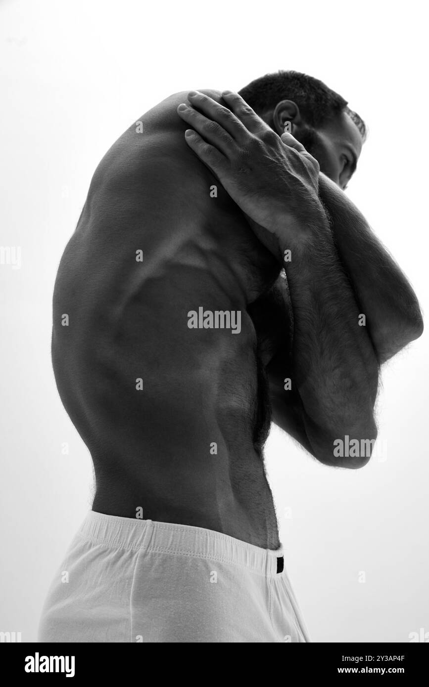 Stylish young man stretches hi-res stock photography and images - Alamy