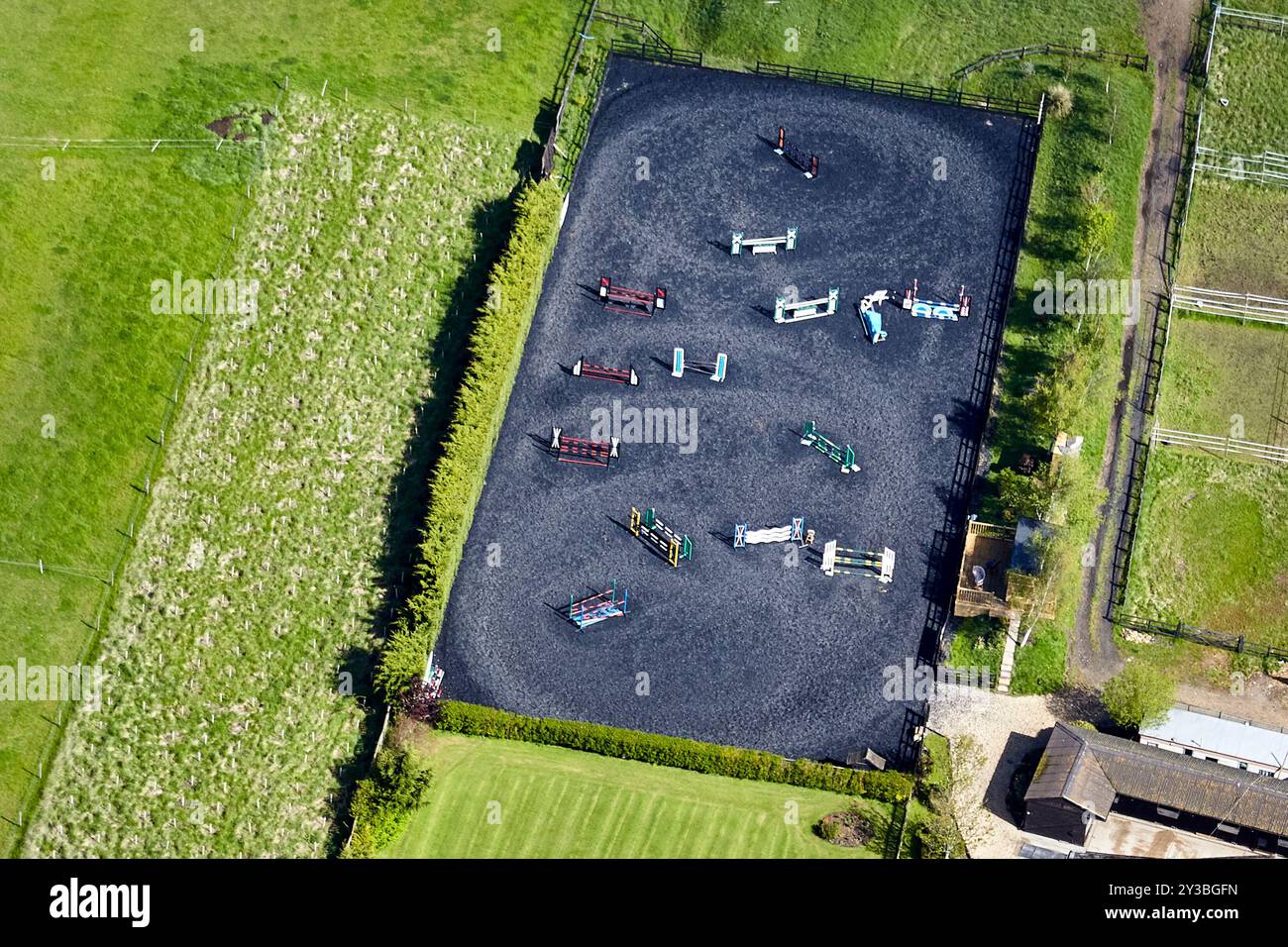 Aerial photograph of an equestrian center with obstacles set for horse ...
