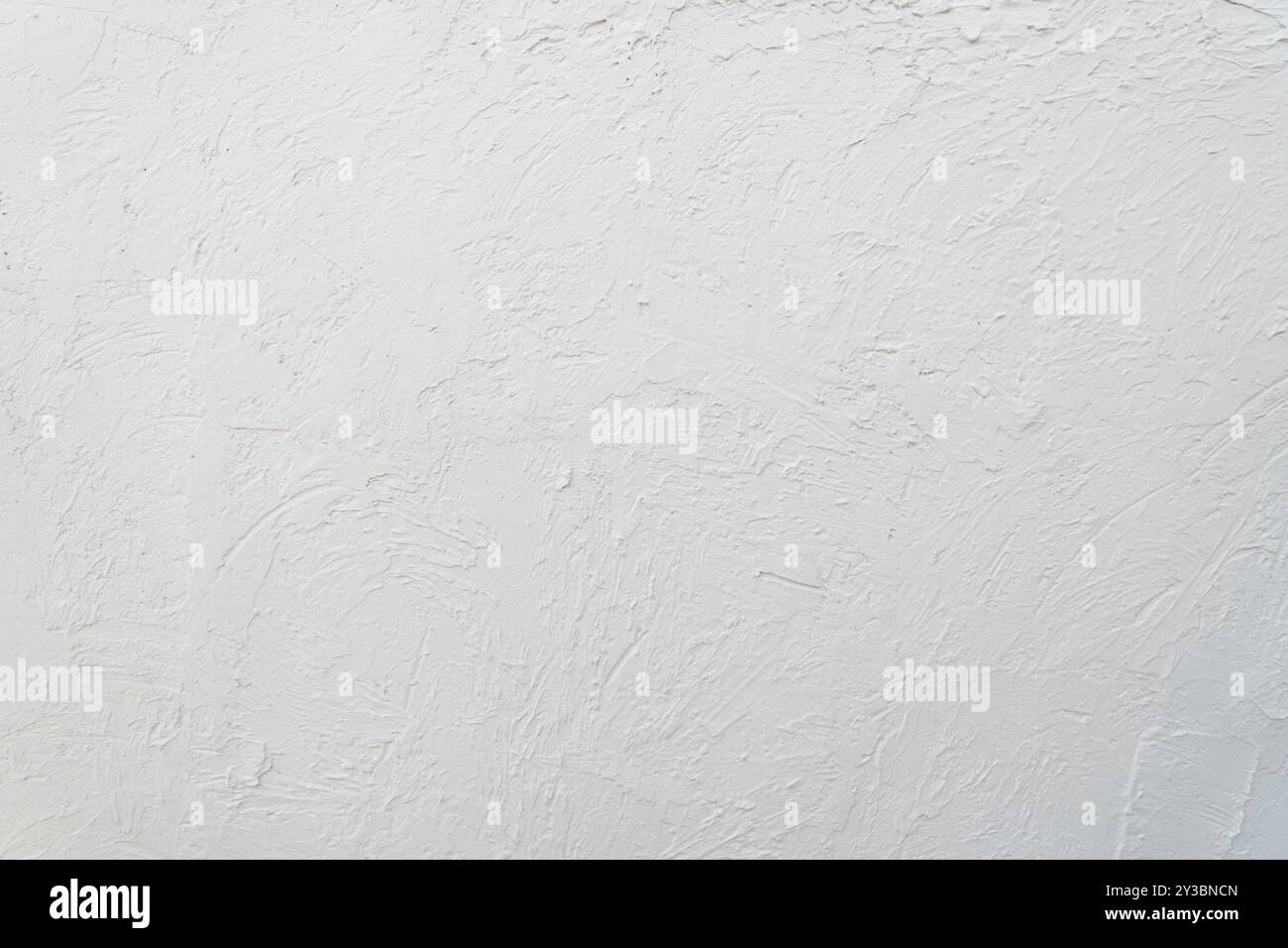 concrete wall with a raw, unfinished look showcases the rough texture ...