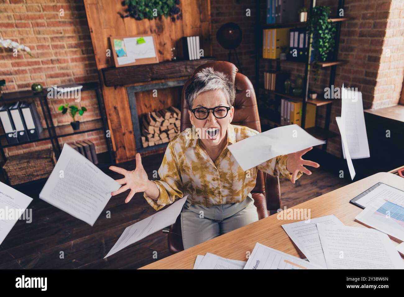 Photo of irritated annoyed crazy lady sitting armchair screaming ...
