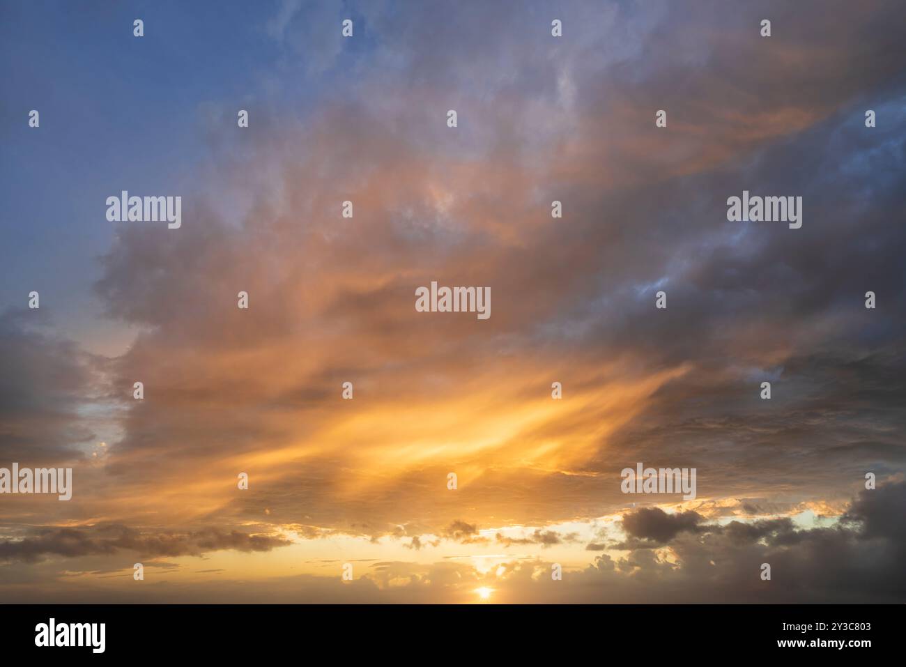 Glowing real sky at sunset texture background overlay. Dramatic red ...