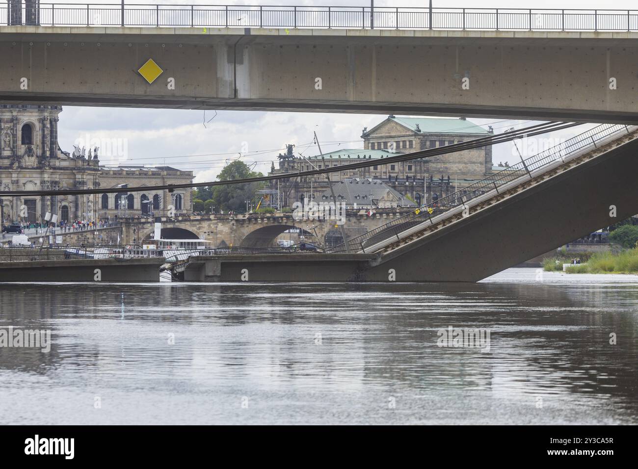 In the early hours of the morning, a section of the Carola Bridge ...