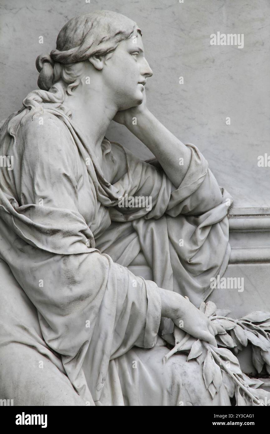 Cemetery mourning statue of a woman Stock Photo - Alamy