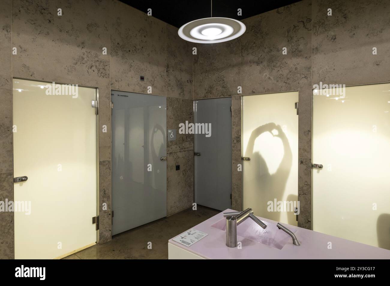 Unisex toilets and washbasins in the basement, Oodi Central Library and ...