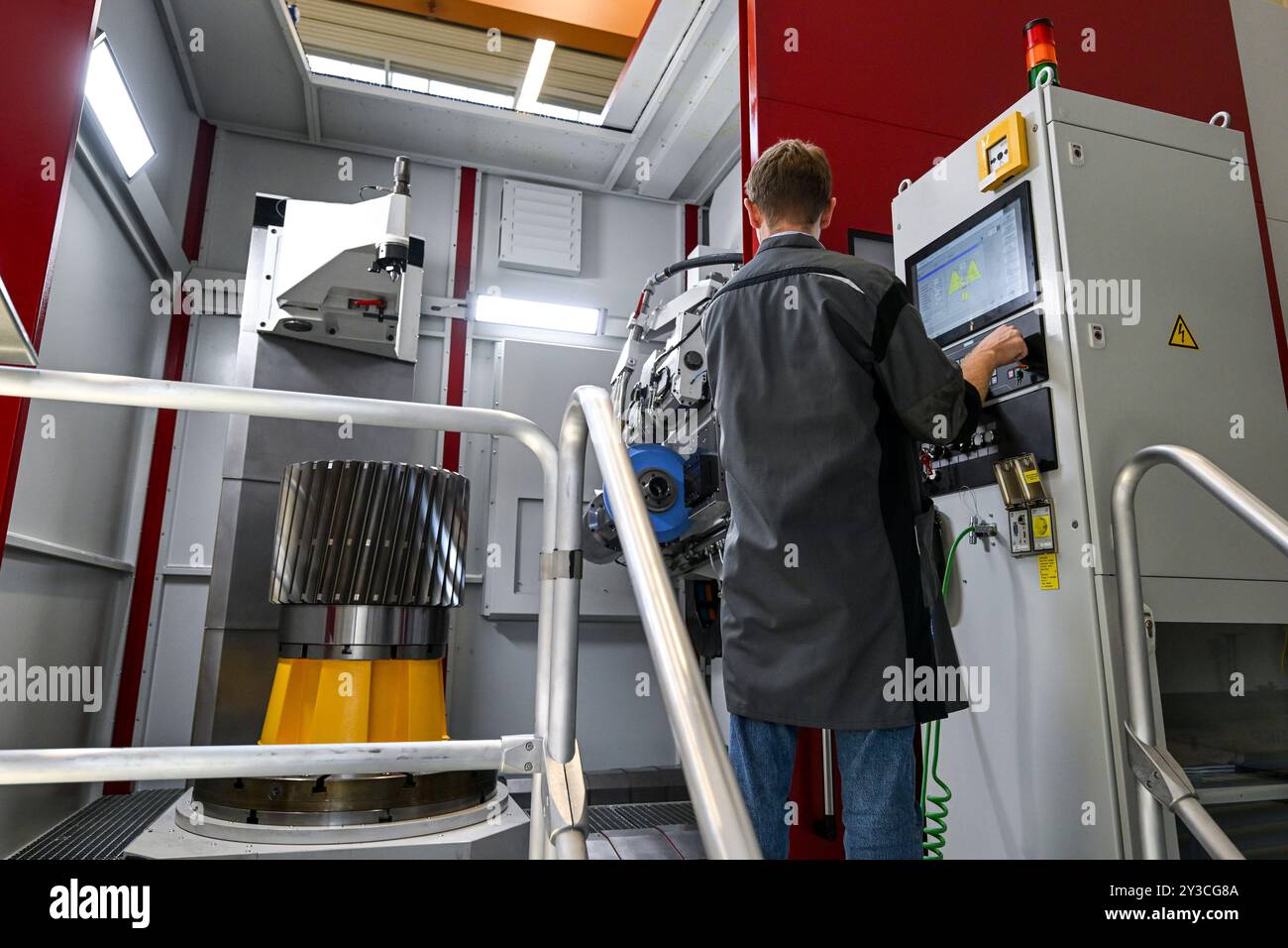 Skilled worker operates grinding machine hi-res stock photography and ...
