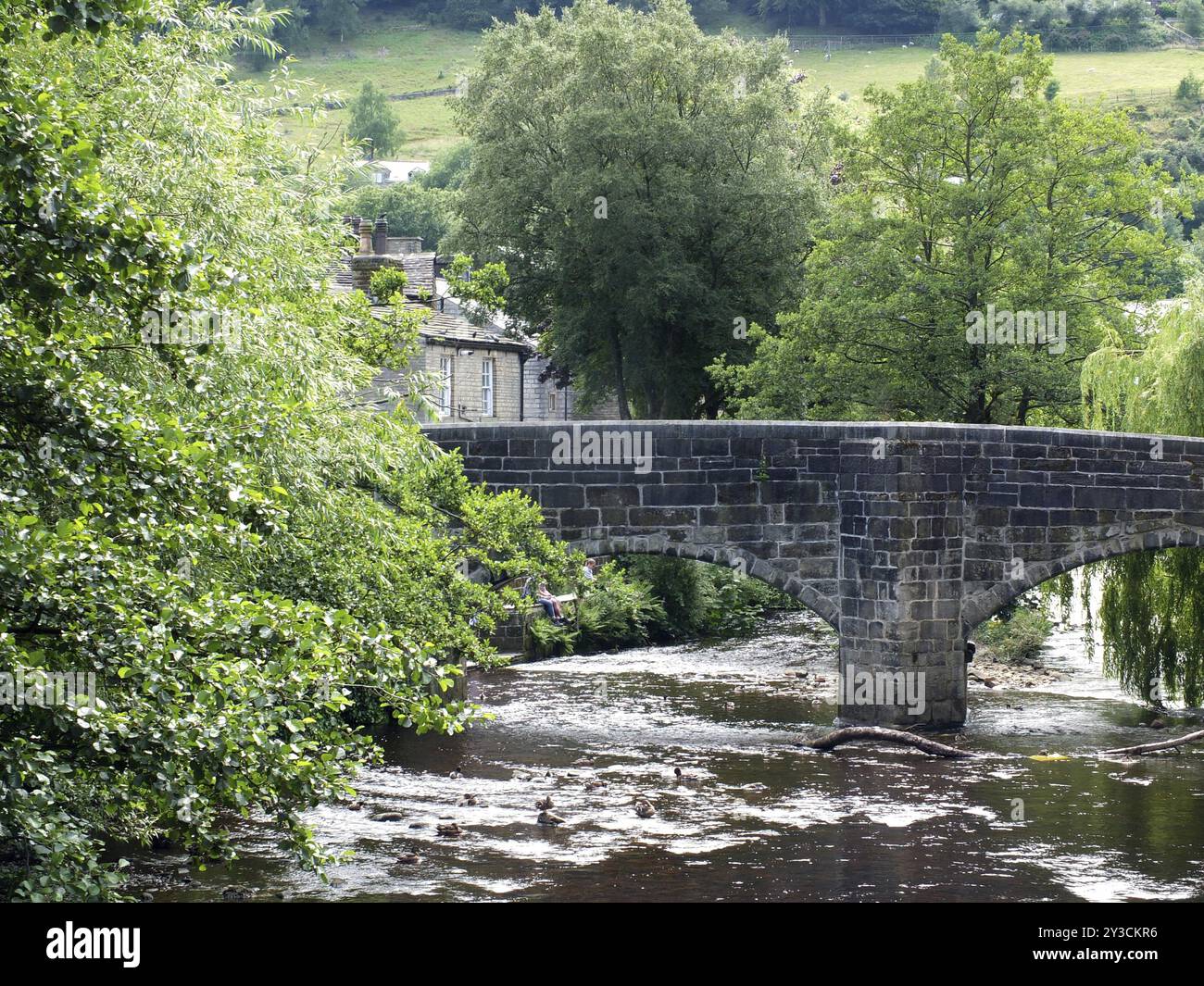 View of the historic packhorse bridge in the town of hebden bridge in ...