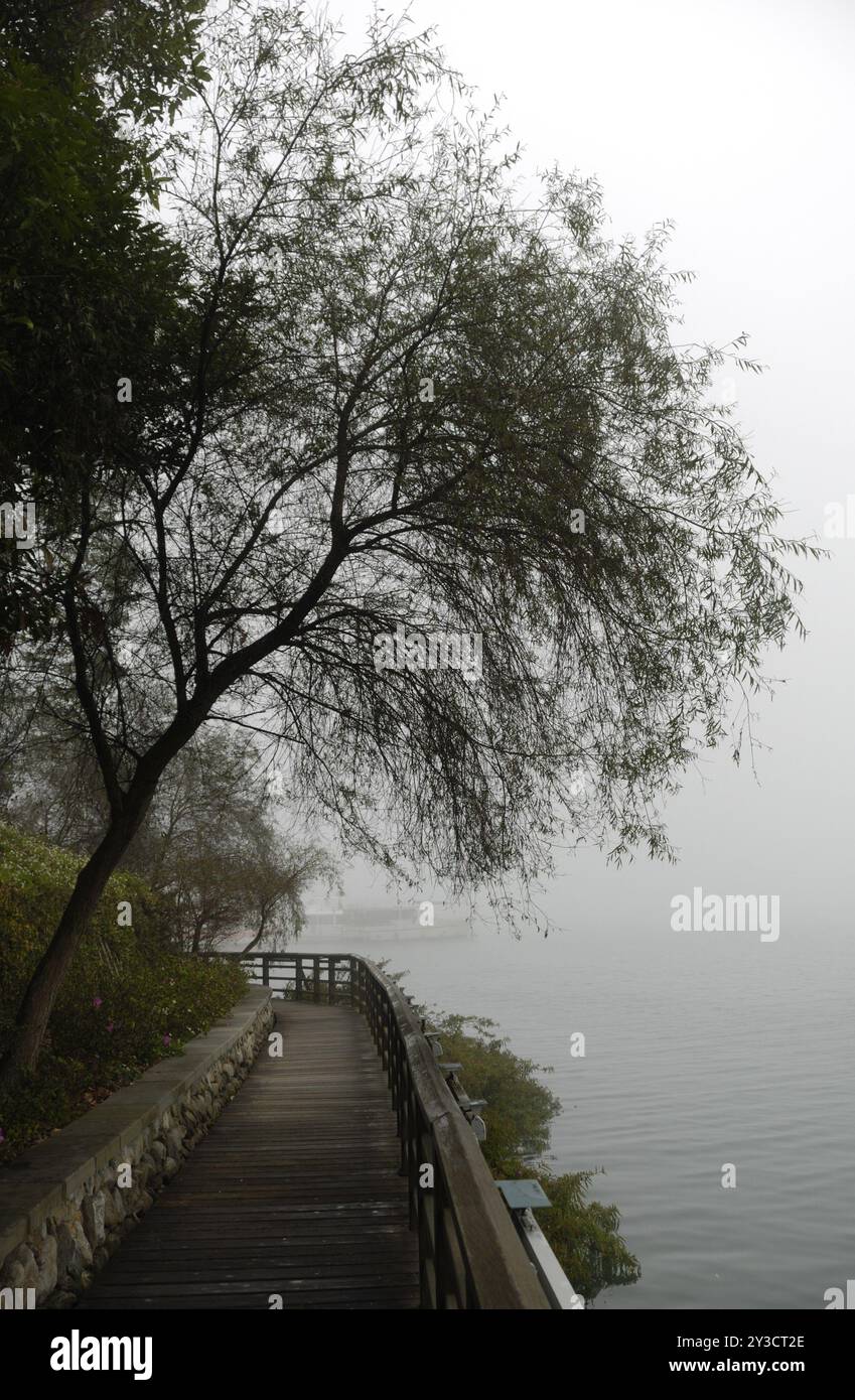 Fog over the promenade at Sun Moon Lake, Taiwan, Asia Stock Photo - Alamy