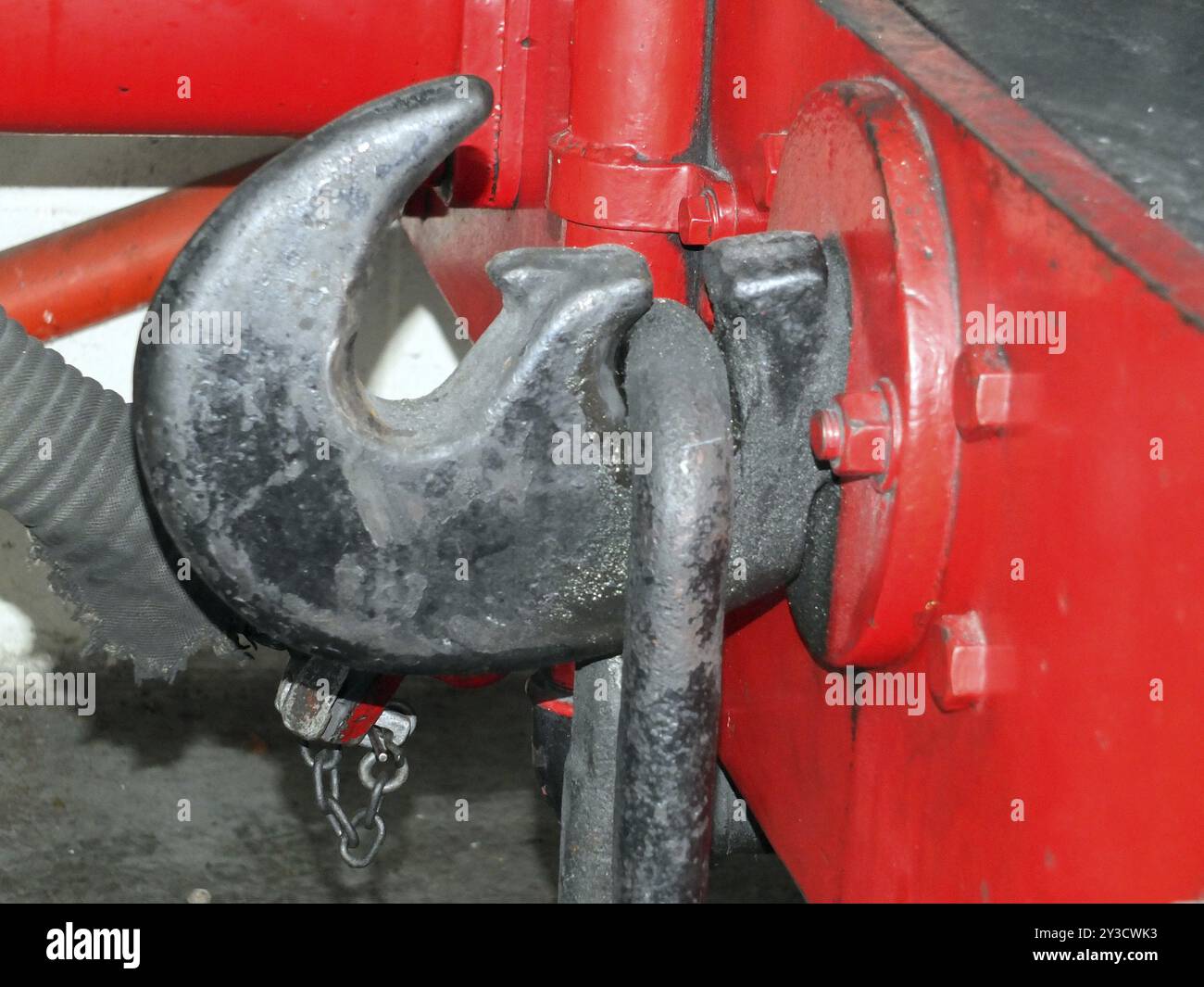 Coupling hook from an old steam locomotive painted black on red buffers ...