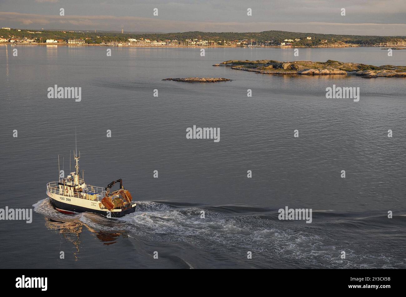 Small fisher boat in far hi-res stock photography and images - Alamy