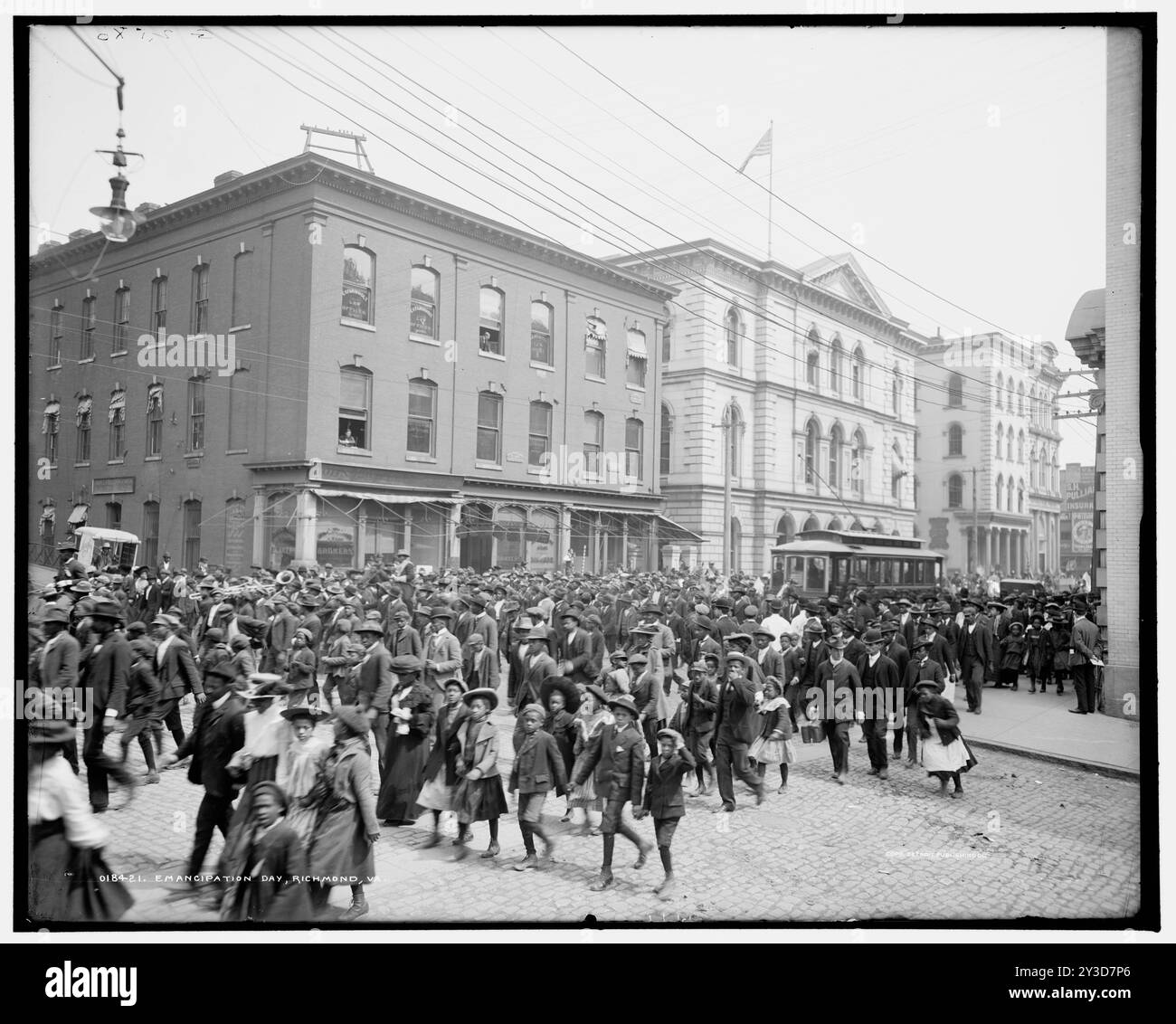 Photograph shows an Emancipation Day parade on Main Street in Richmond ...
