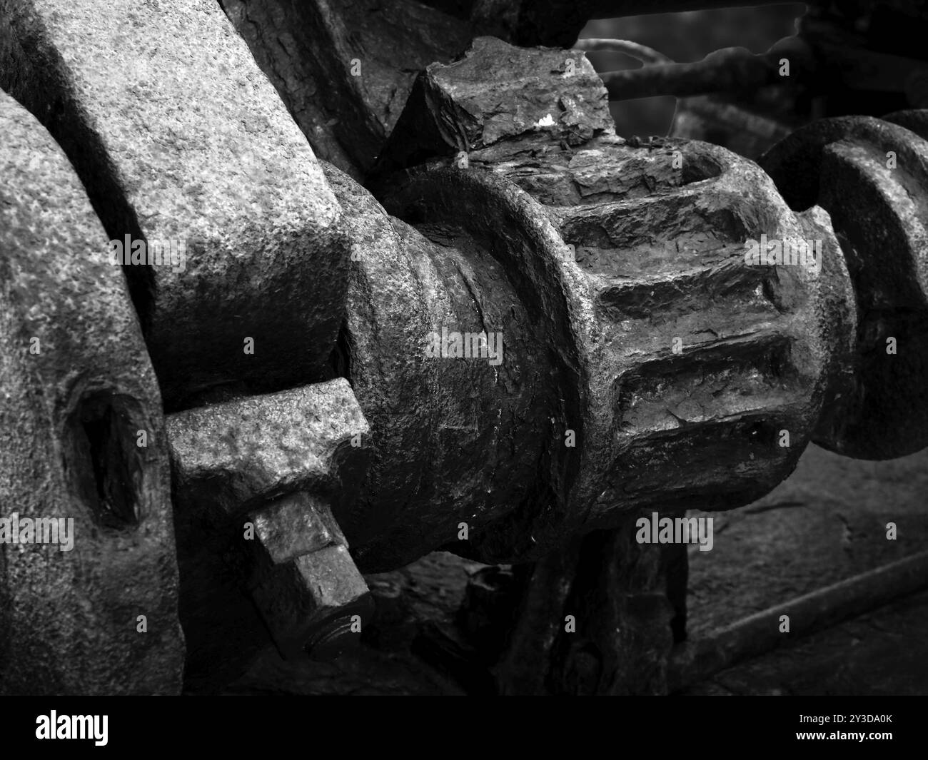 Monochrome image of rusted cogs and gears on an old abandoned broken ...
