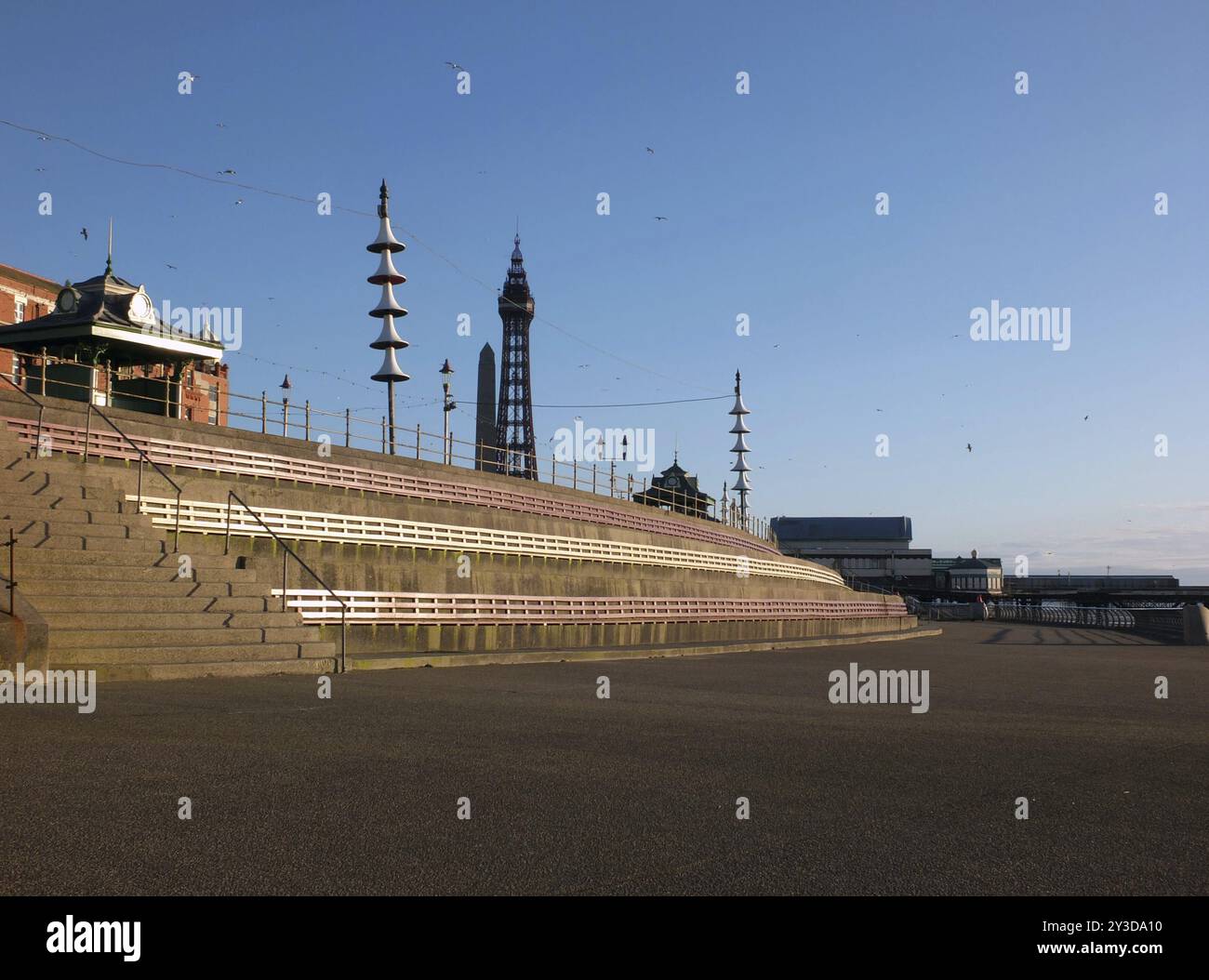 The pedestrian walkway near blackpool north pier with benches and ...