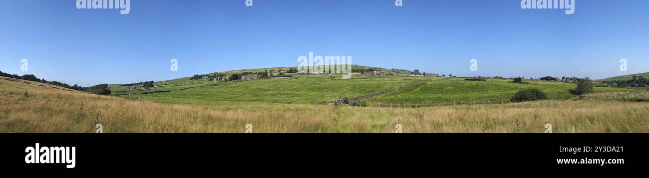 Long panoramic view of green fields and village houses and ancient ...