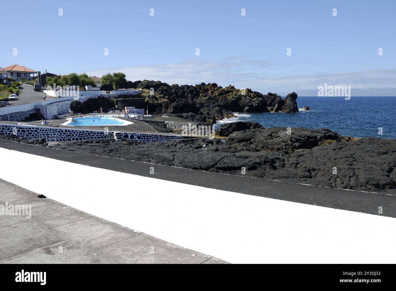 Swimming pool on the black lava coast on Pico Stock Photo - Alamy