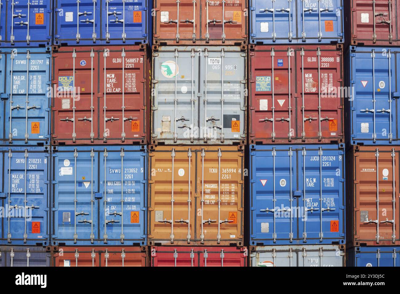 Stacked colourful freight containers at the container terminal in Holz ...