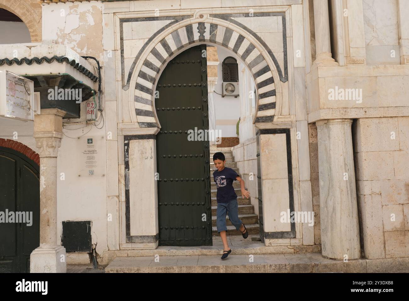 Arabic boy running hi-res stock photography and images - Alamy