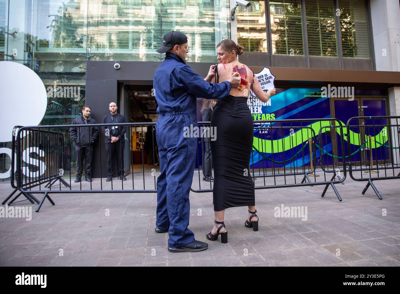 London, UK. 13th Sep, 2024. Two PETA activists hold demonstrate outside ...
