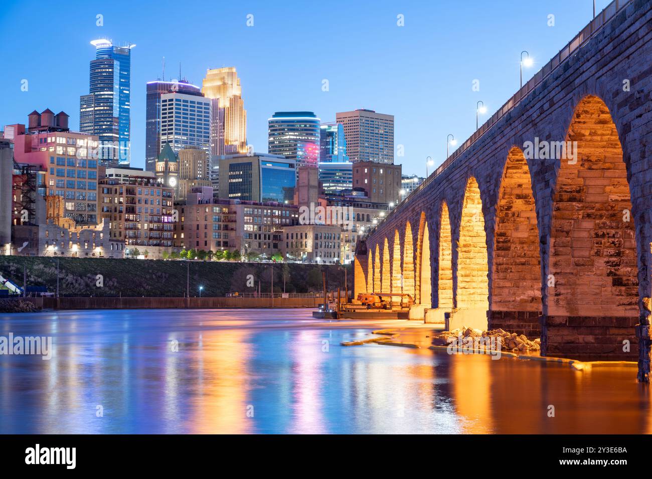 Minneapolis, Minnesota, USA skyline with the Stone Arch Bridge on the ...