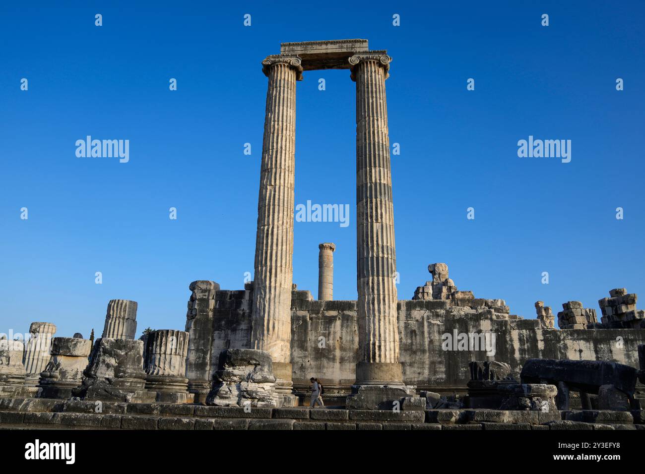People visit the ruins of Temple of Apollo in City of Didim, Turkey ...