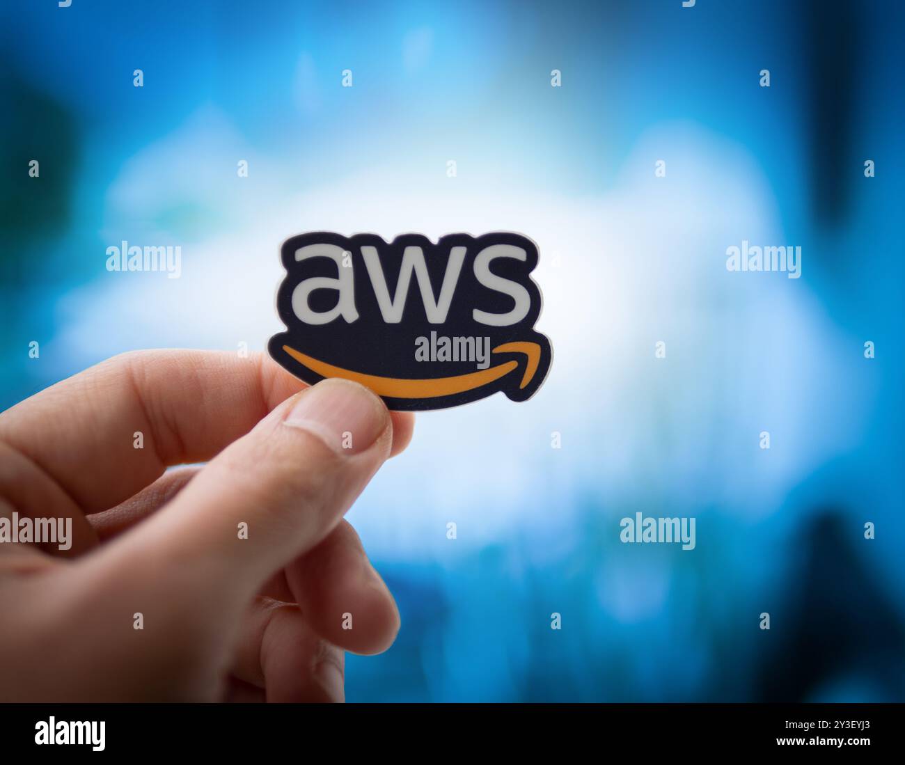 LOS ANGELES, CA - June 1, 2024: Human hand holding Amazon Web Services ...