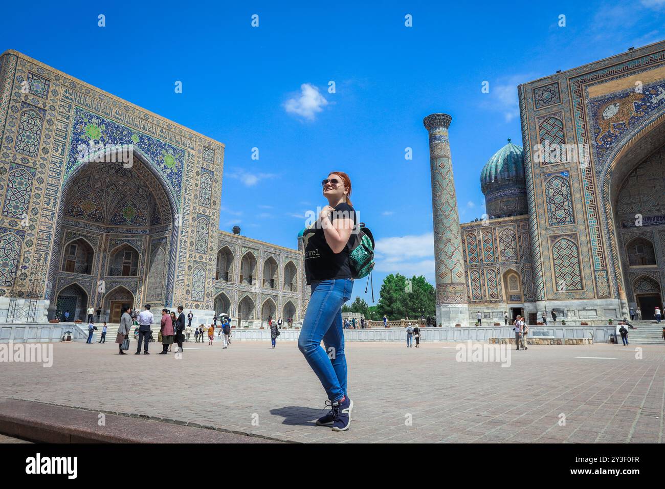 Tourists travelling along Silk Road in Ancient Samarkand city ...