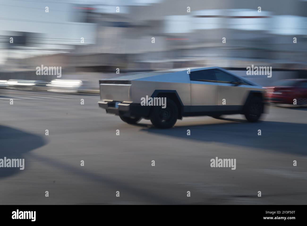 LOS ANGELES, CA - March 26, 2024: Tesla Cybertuck speeding through city ...