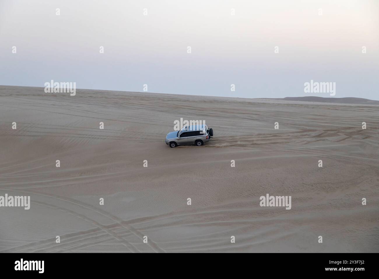 Off-road dune bashing inland sea Doha Qatar Stock Photo - Alamy