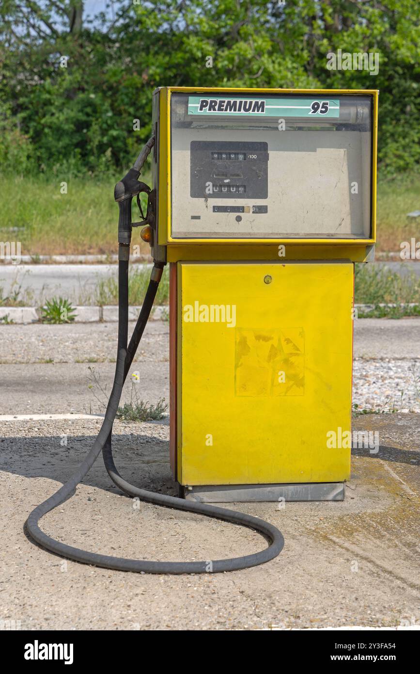 Yellow Premium Petrol Pump Gasoline at Old Fueling Station Stock Photo ...