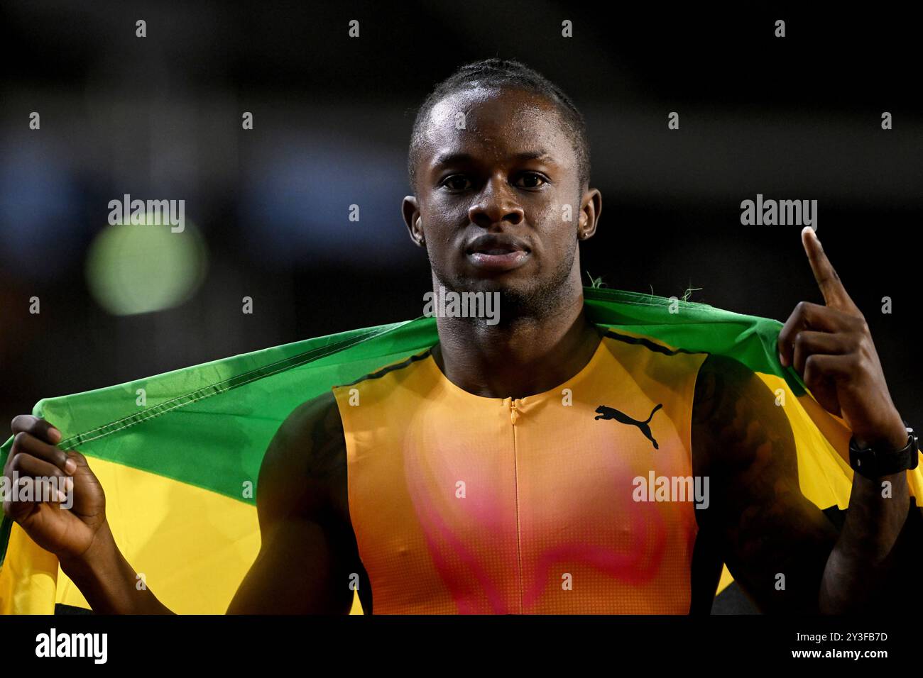 Ackeem Blake, of Jamaica, poses after winning the men's 100 meters ...
