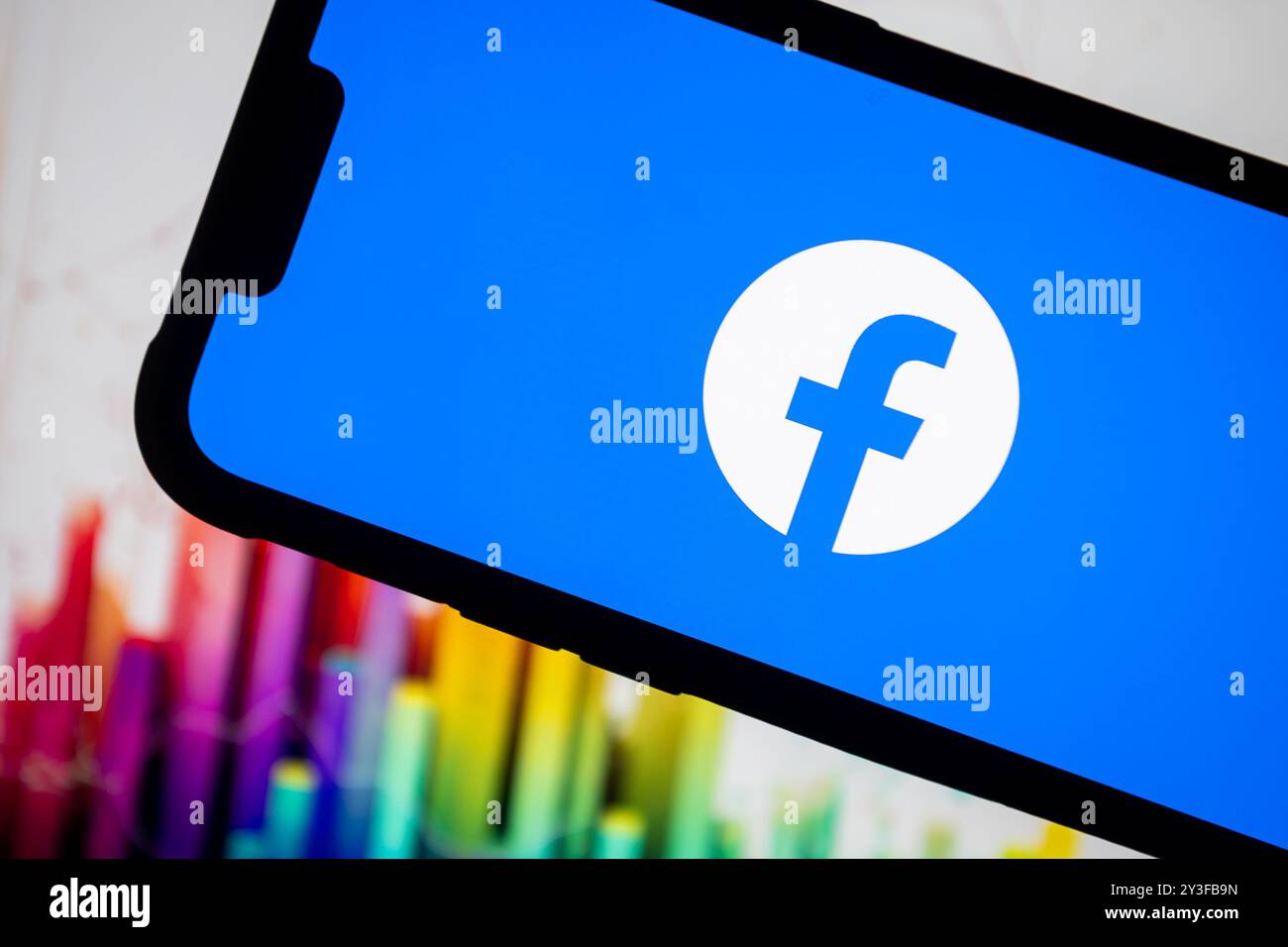 In this photo illustration, the Facebook logo seen displayed on a ...