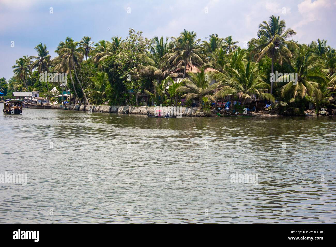 Alleppey, Kerala, India - May 15 2024: Scenic Houseboat cruise along the Alappuzha backwaters in ...