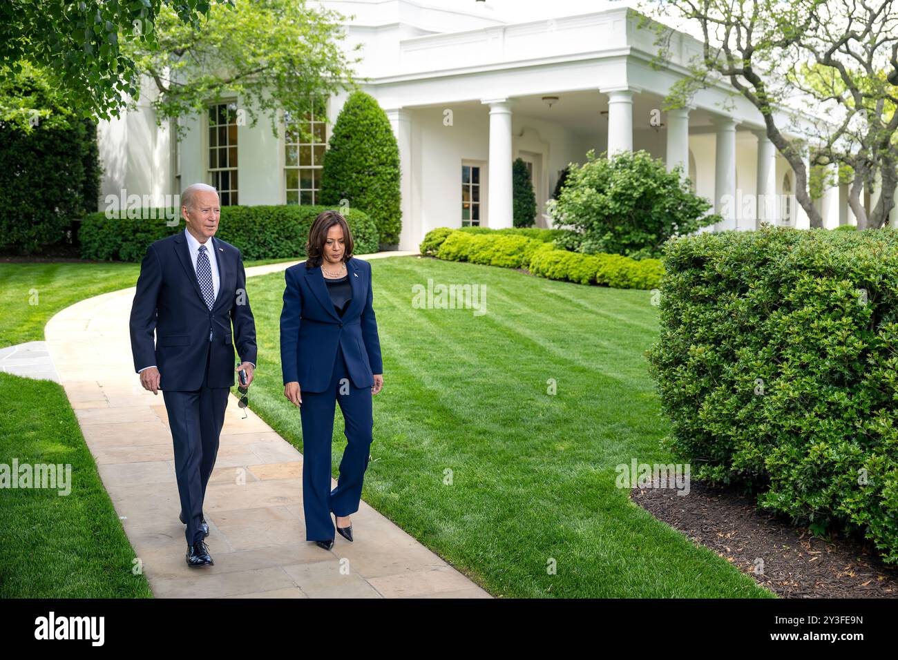 President Joe Biden and Vice President Kamala Harris walk from the Oval ...