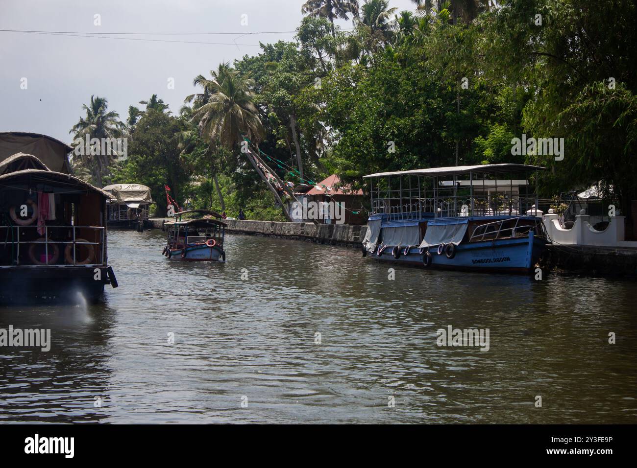 Alleppey, Kerala, India - May 15 2024: Scenic Houseboat cruise along the Alappuzha backwaters in ...