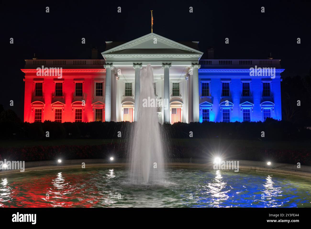 The White House is lit in red, white and blue Friday, July 26, 2024 in ...
