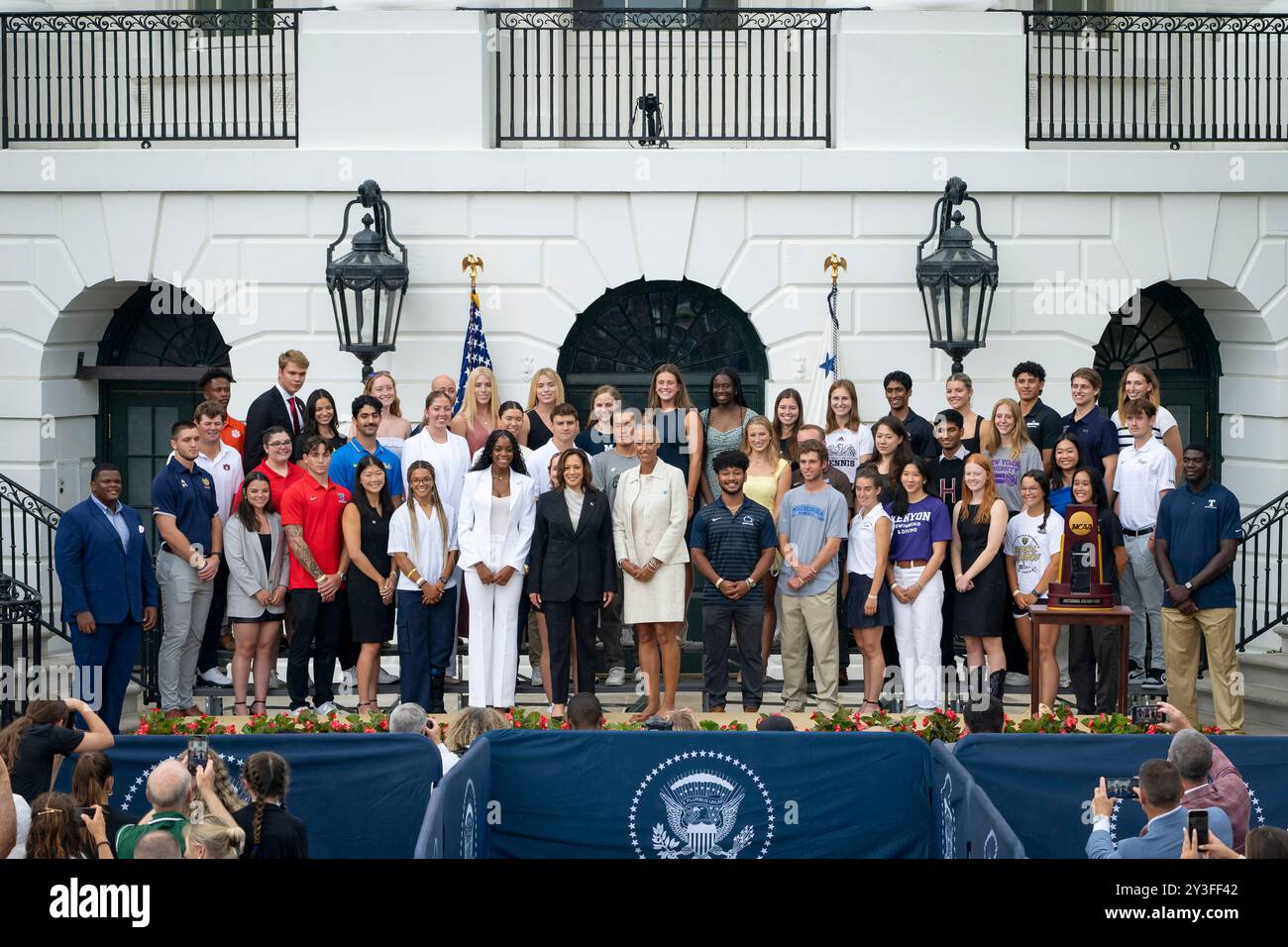Vice President Kamala Harris poses for a photo with student athletes ...
