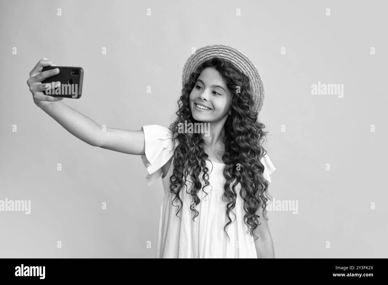Teenage girl with smart phone. Portrait of teen child using mobile ...