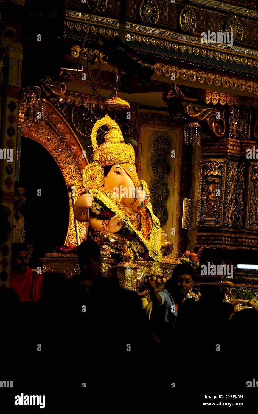 13 September 2024, Pune, Maharashtra, India, A huge crowd gathers to ...
