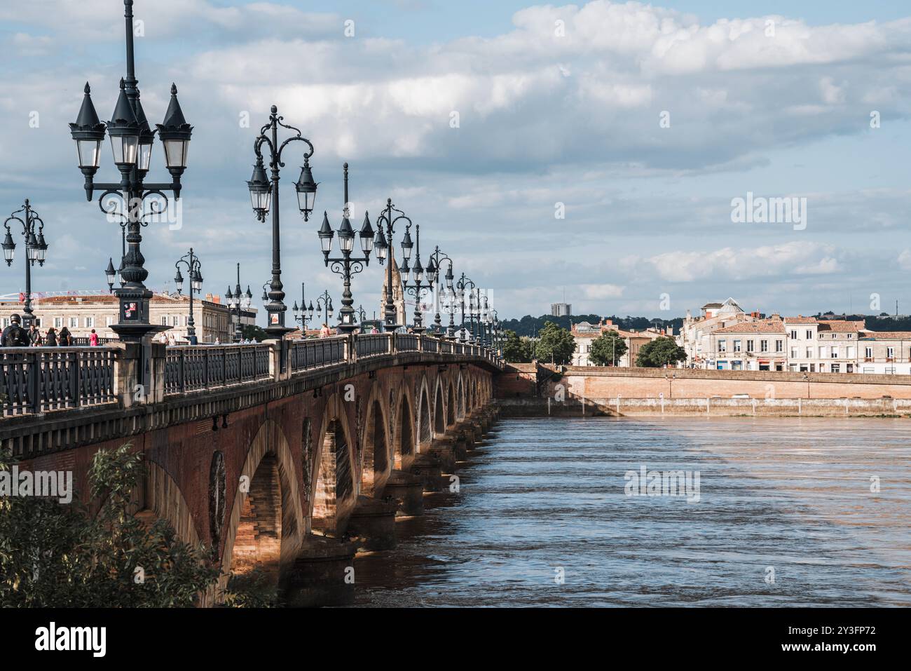 Pont de pierre, a historic bridge at sunset in Bordeaux, France Stock ...